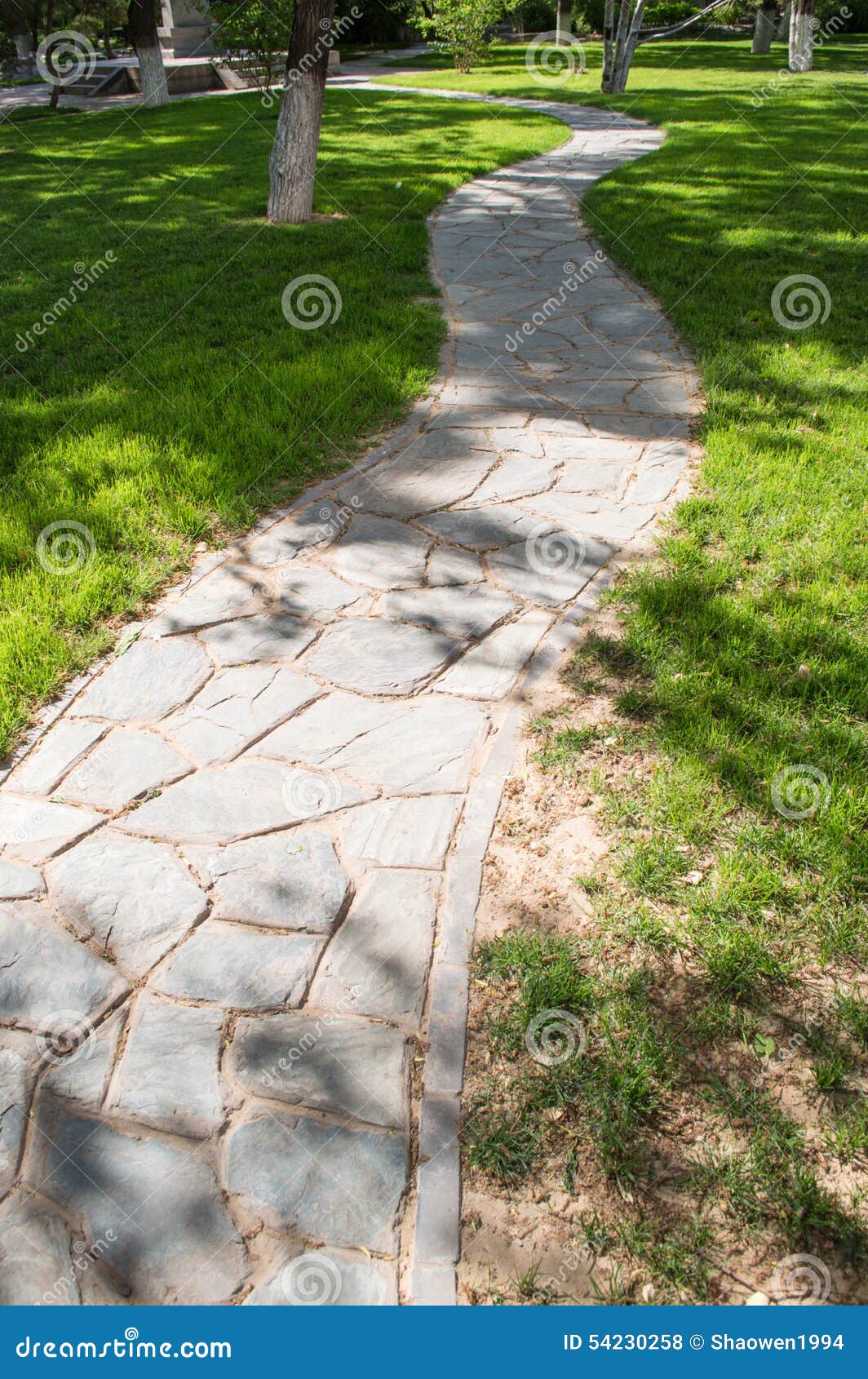 Curve Stone Walkway stock photo. Image of pavement, green - 54230258