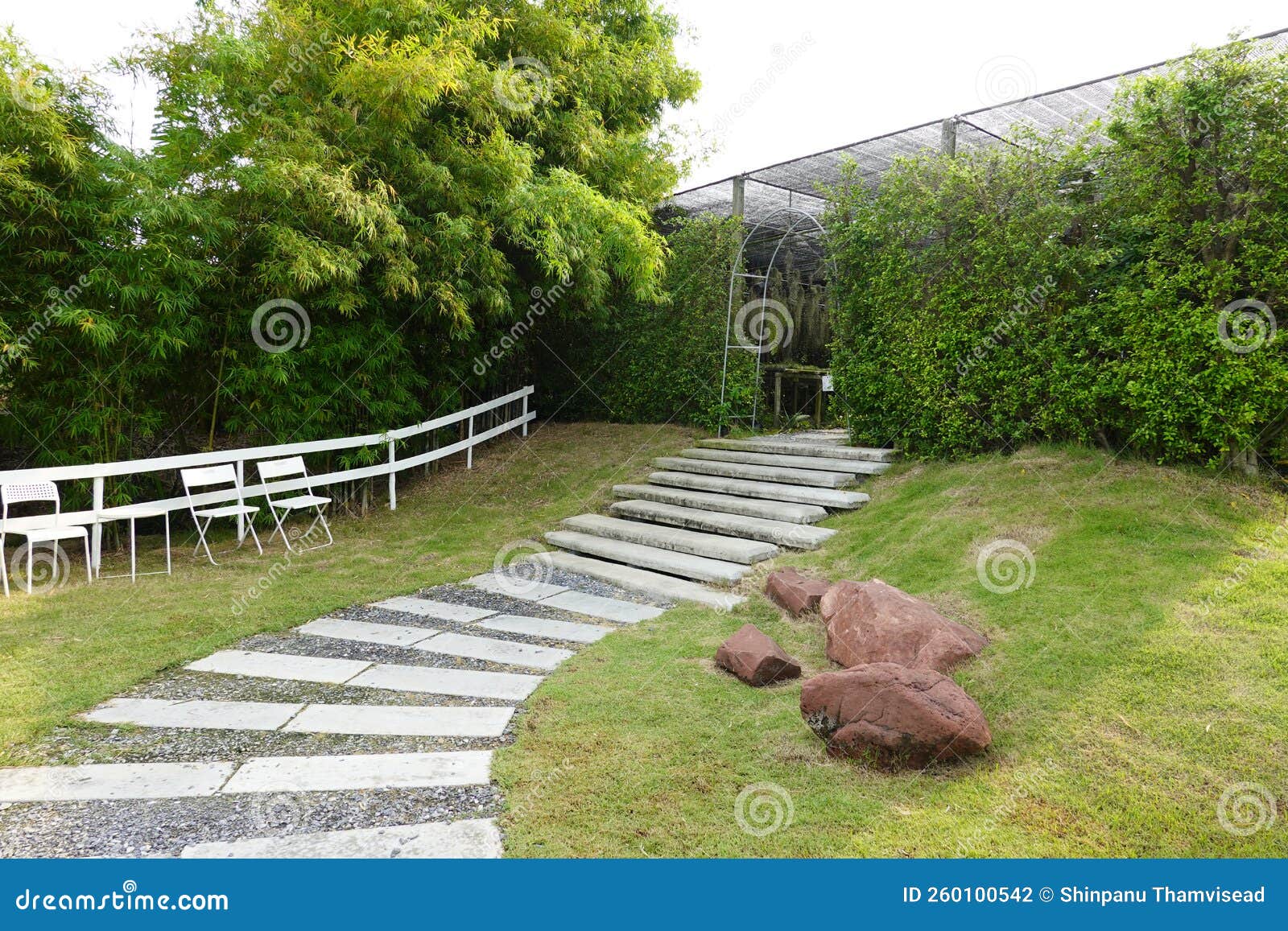 Curve Walkway Made Stone Path in the Garden. Tropical Garden Stock ...
