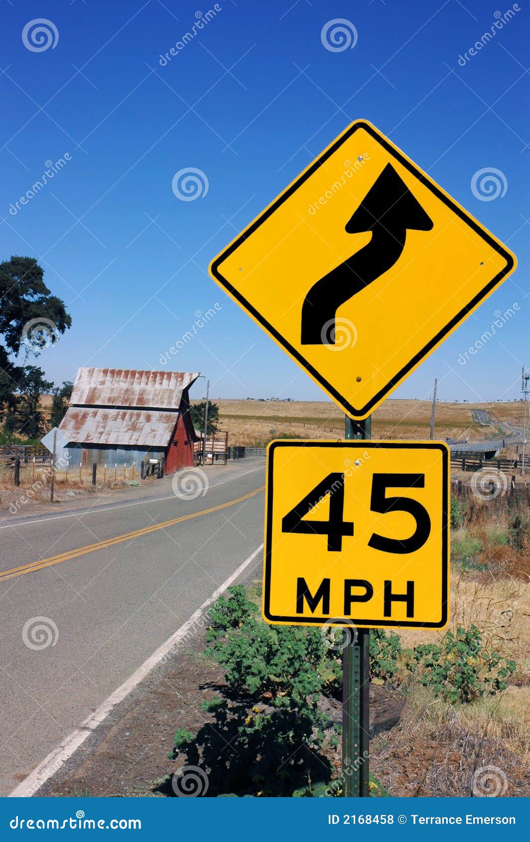 Curve Warning Road Sign stock photo. Image of empty, warning - 2168458