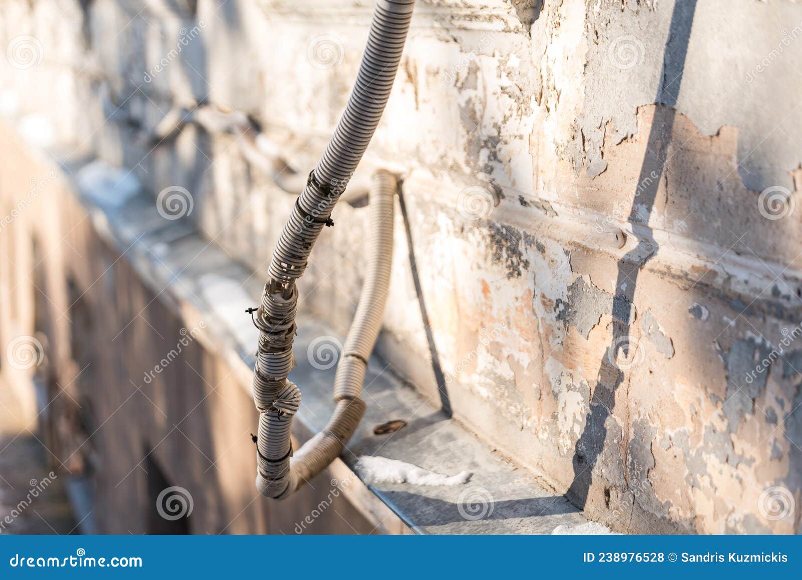 Curved, Damaged Plastic Hose To Protect Electrical Wires Stock Photo ...