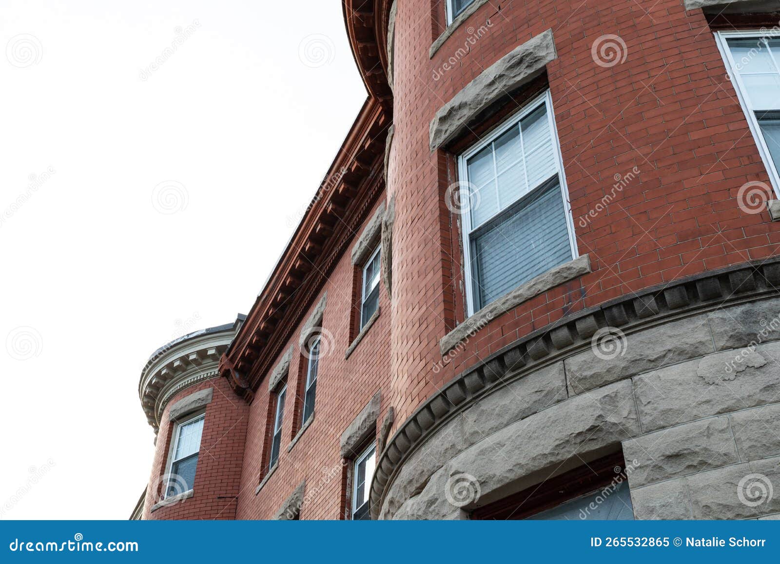 Curved and Flat Faces of an Old Urban Apartment Building Featuring ...