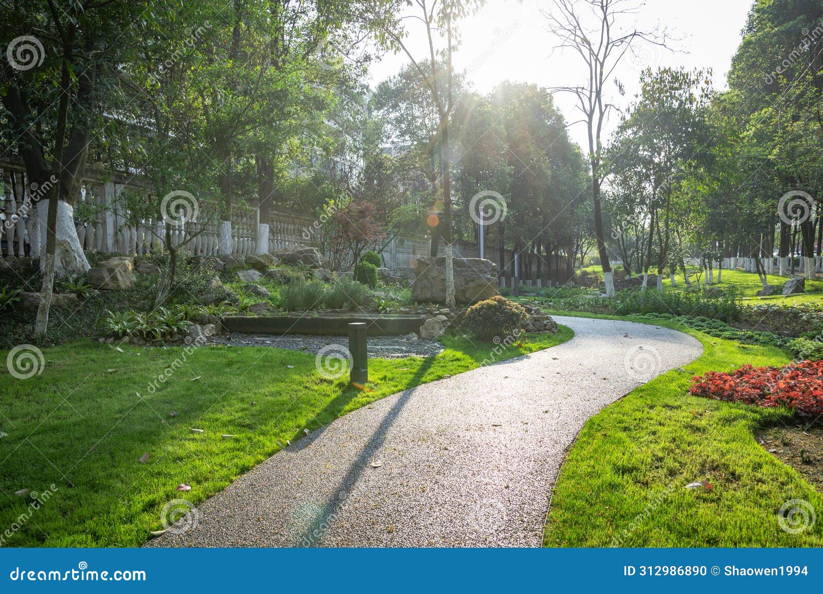 Curved garden path in park stock photo. Image of flowe - 312986890