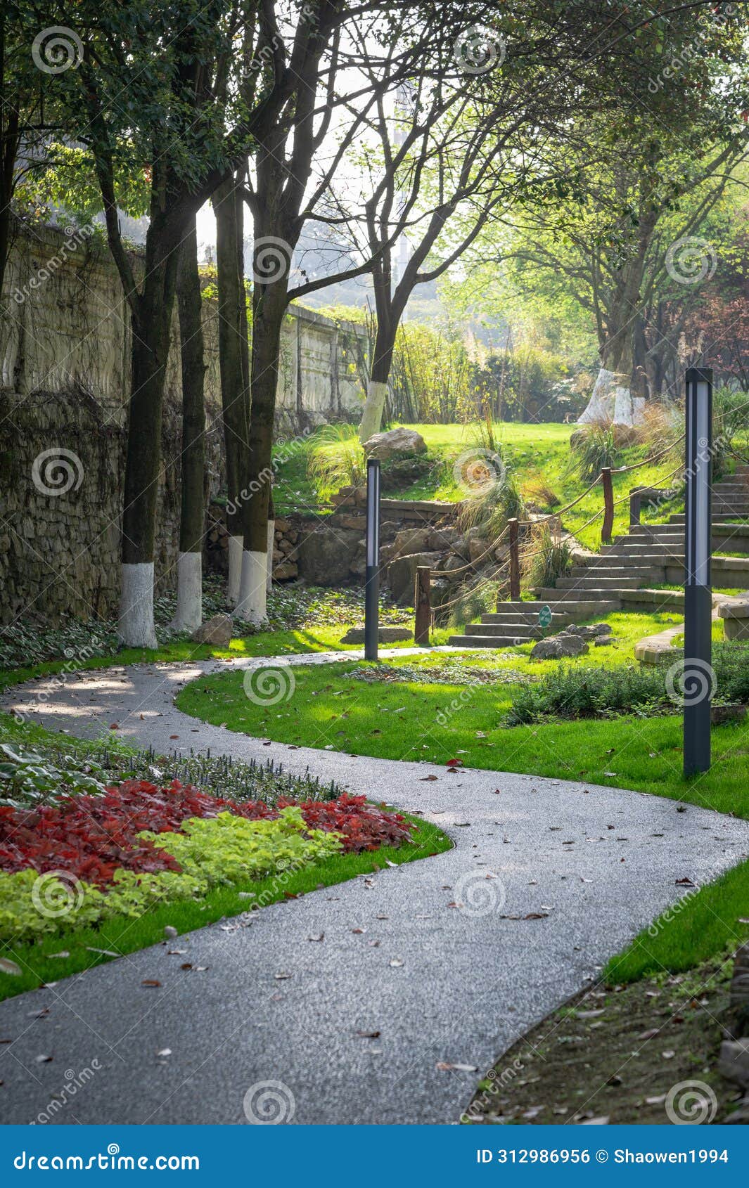 Curved garden path in park stock photo. Image of boulevard - 312986956