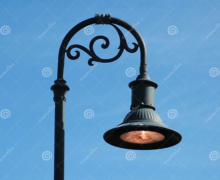 Curved lamp post stock image. Image of post, ornate, light - 1234259