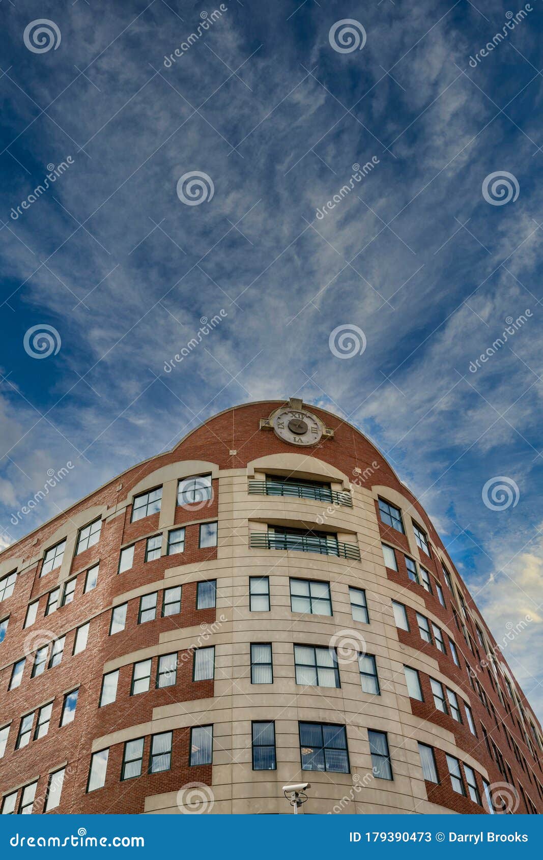 Curved Office Building with Clock Stock Image - Image of urban ...
