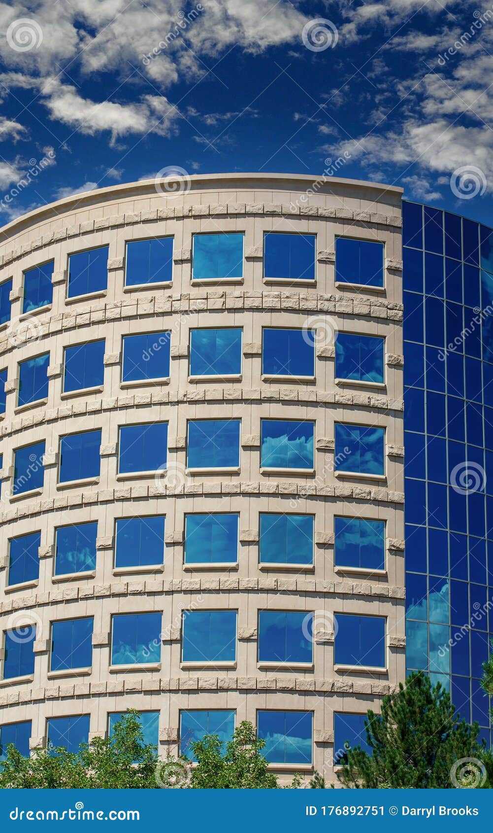 Curved Office with Clouds Reflected in Glass Stock Image - Image of ...