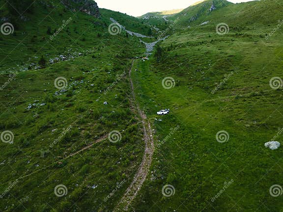 Curved Path through Green Valley in the Mountains Stock Image - Image ...