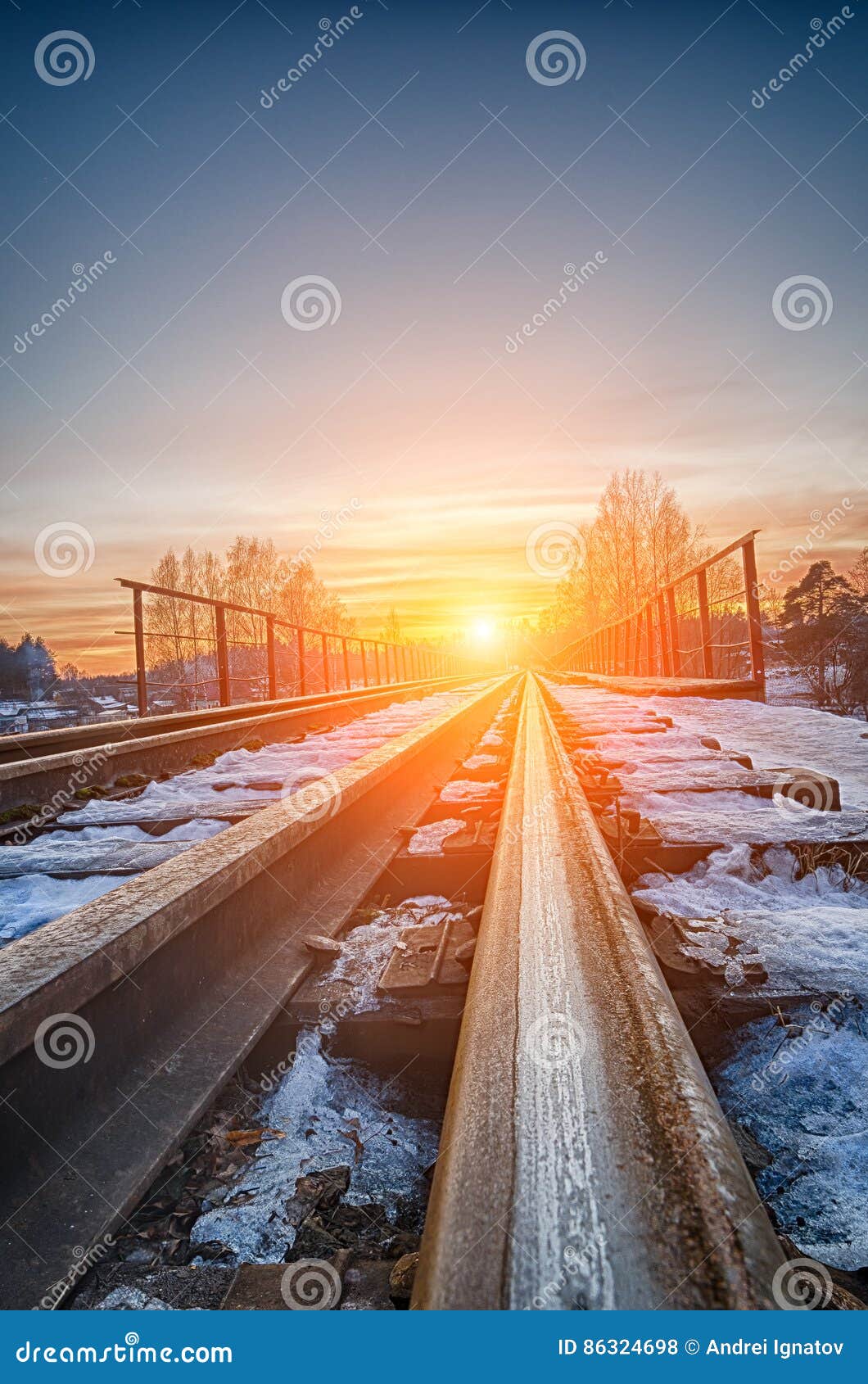 Curved railroad in sunset stock photo. Image of bridge - 86324698