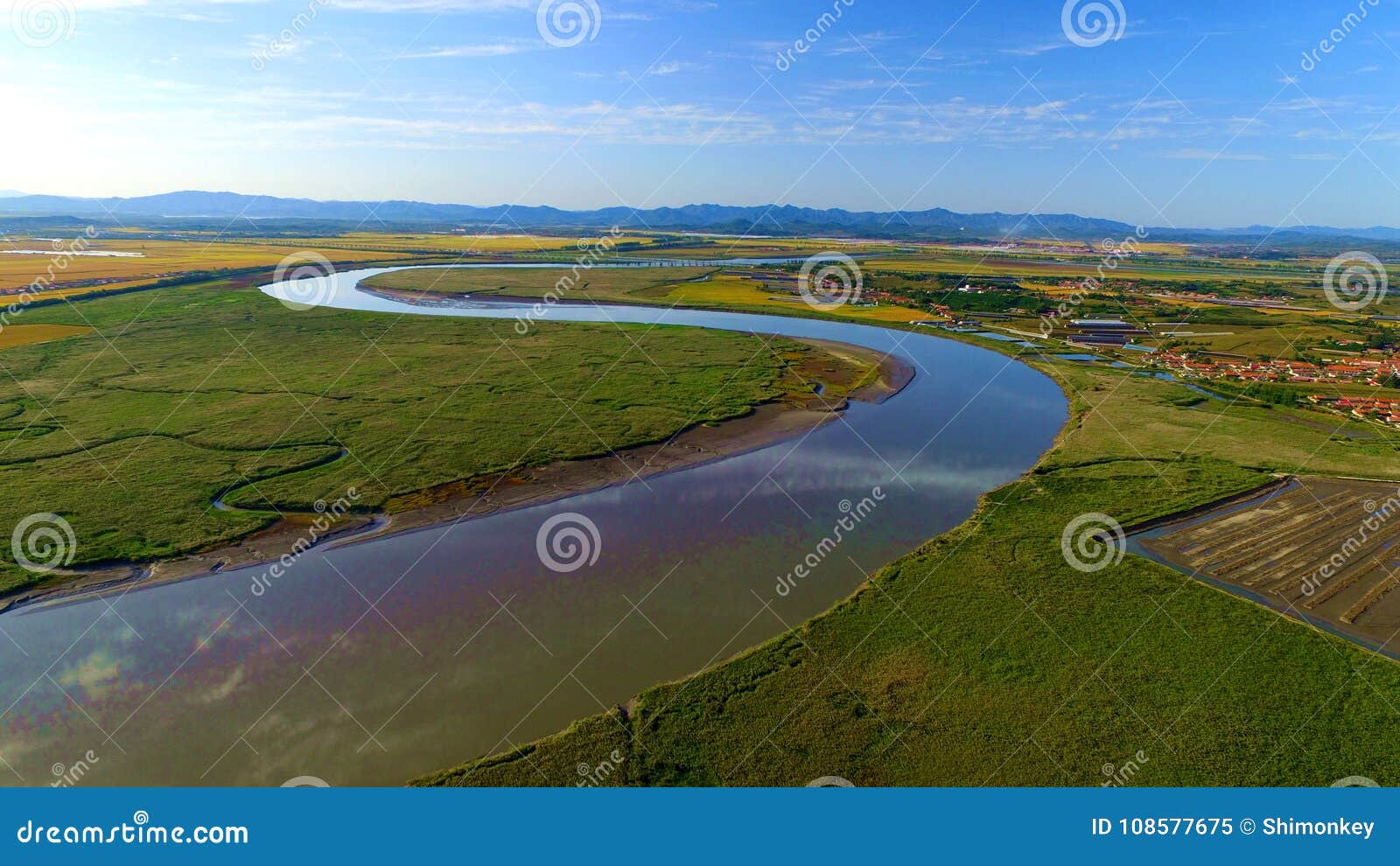 A curved river stock image. Image of river, clouds, grass - 108577675