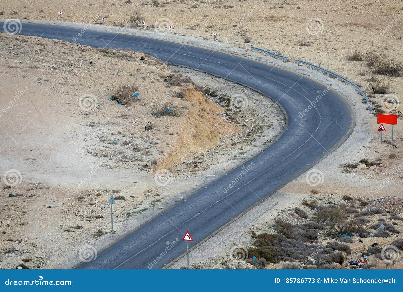 Curved road in the desert stock image. Image of forward - 185786773