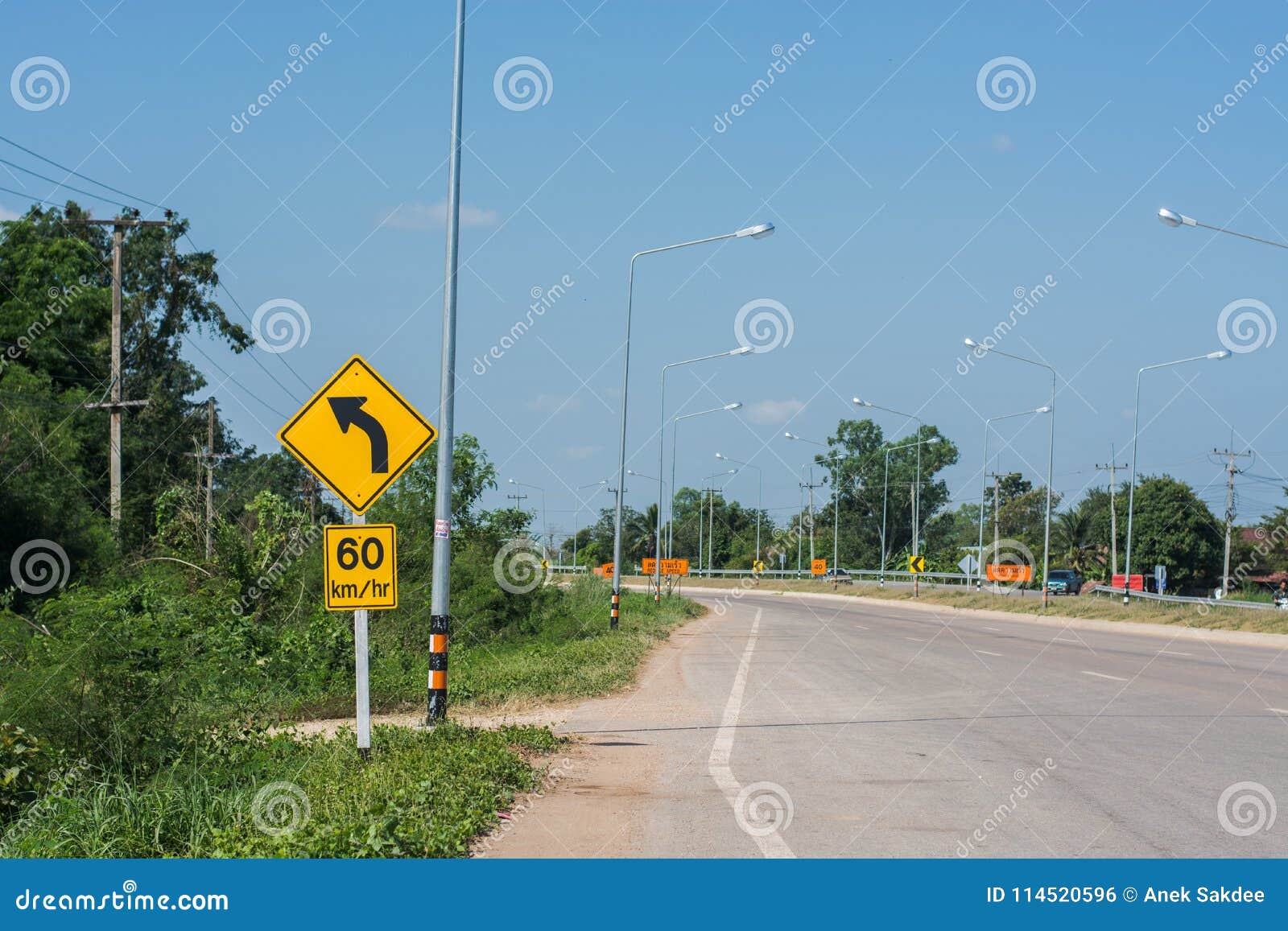 Curved road left sign stock photo. Image of outdoor - 114520596