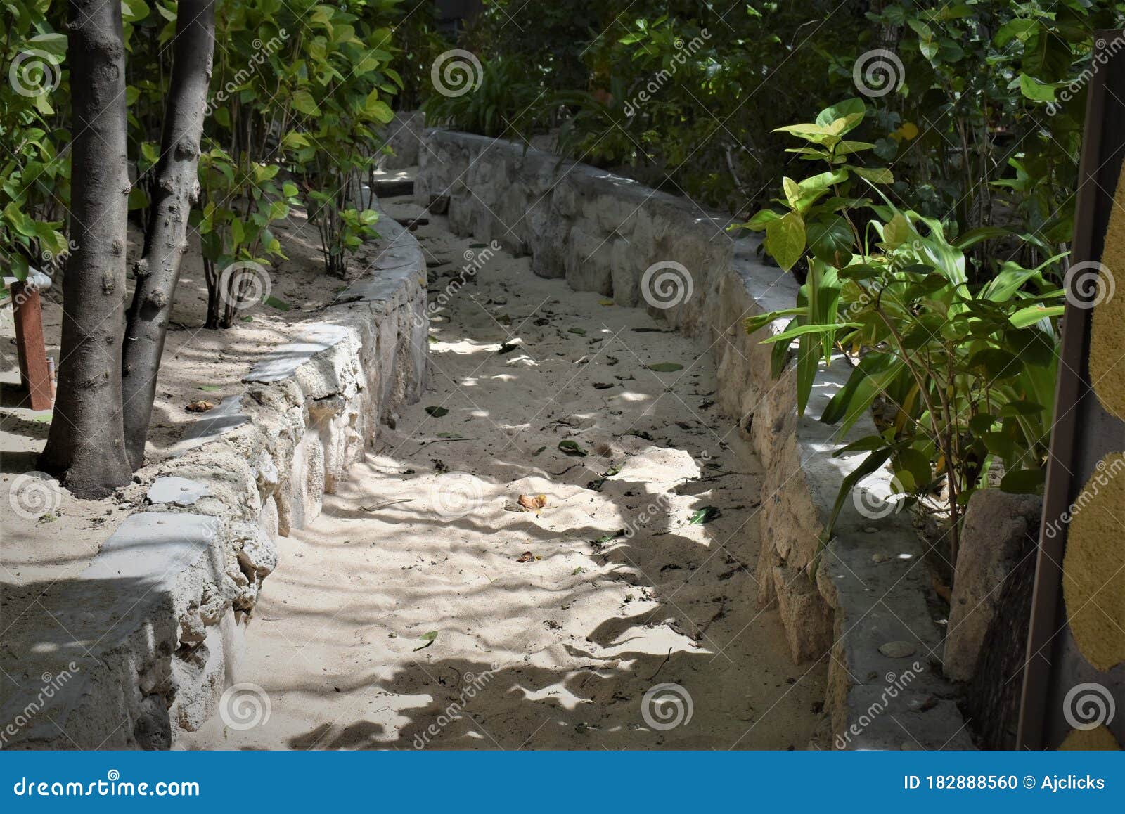 Curved Sandy Path with Rock Borders Stock Photo - Image of plants ...