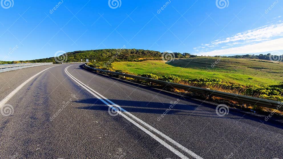Curved section of highway stock photo. Image of blue, road - 9690460