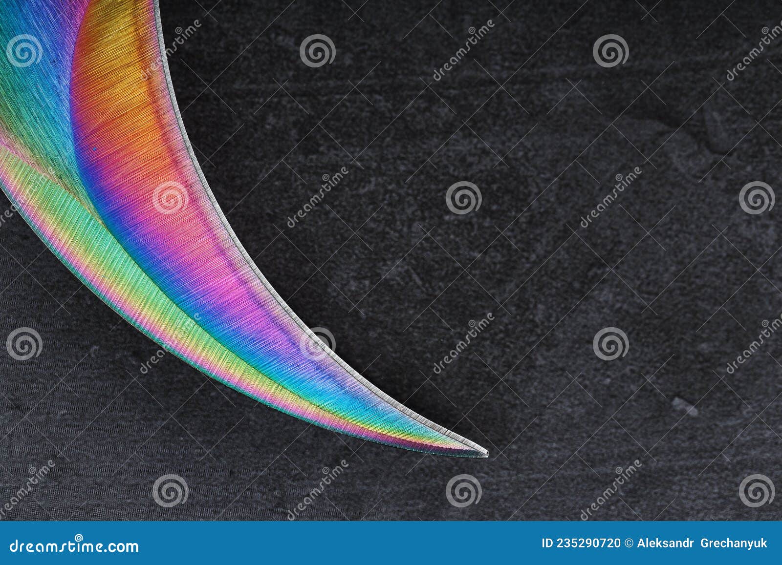 The Curved Sharp Blade of the Kerambit Dagger is a Gradient Rainbow ...