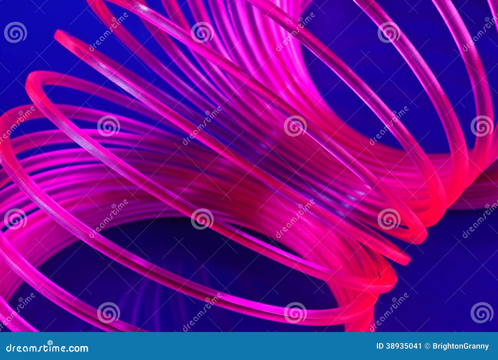 Curved slinky editorial photo. Image of abstract, pink - 38935041