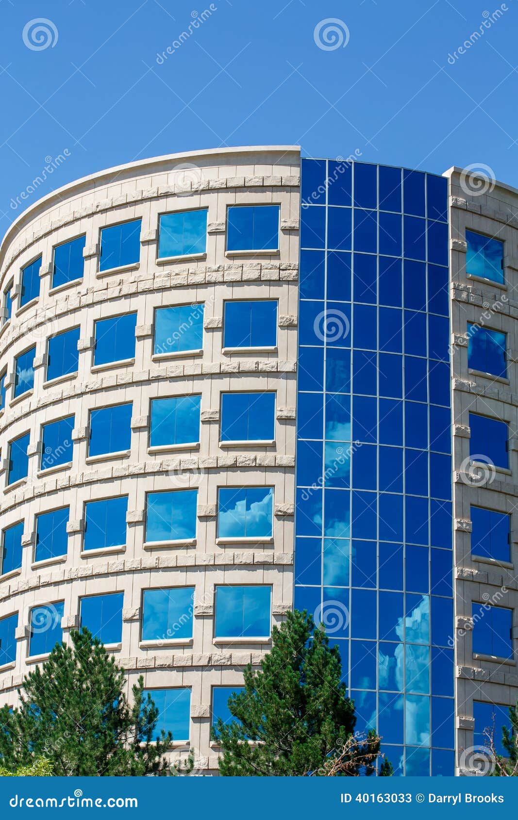 Curved Stone and Blue Glass Office Tower Stock Image - Image of ...