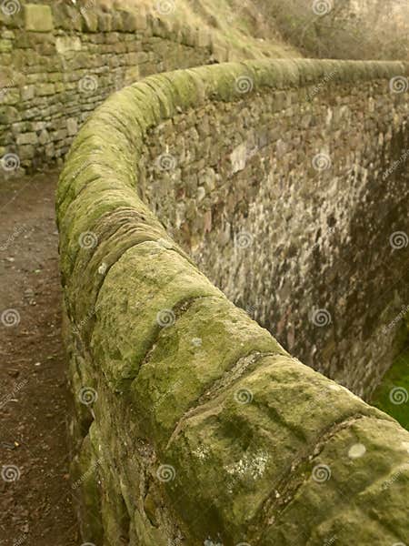 Curved stone wall stock photo. Image of architecture - 12831662