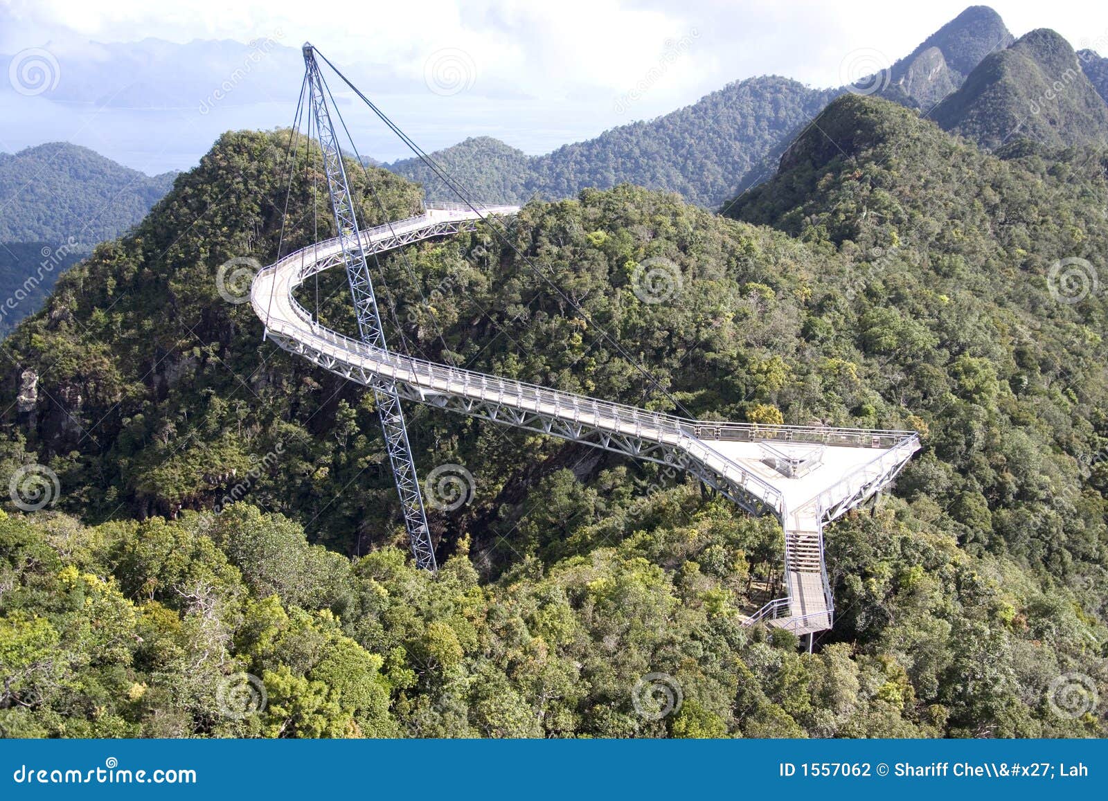 Curved Suspension Bridge stock photo. Image of curve, cloud - 1557062