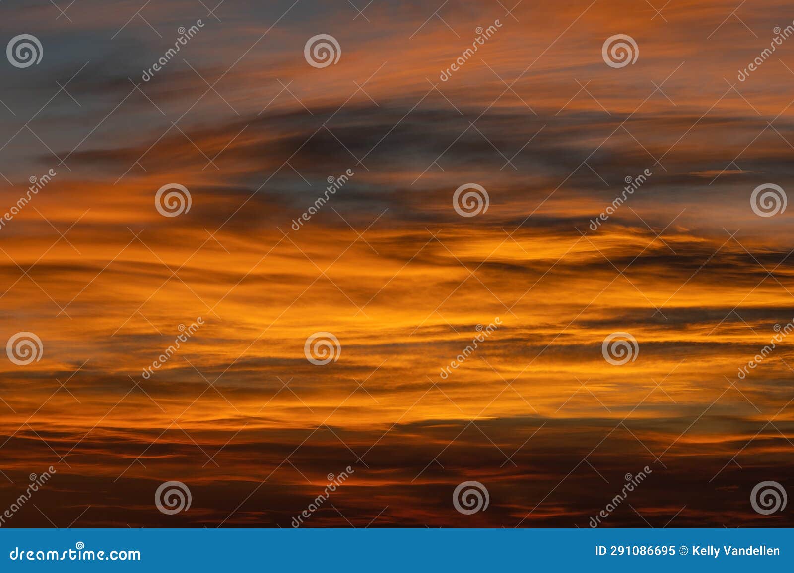 Curving Clouds Make a Faint Eye in the Colors at Sunset Stock Image ...