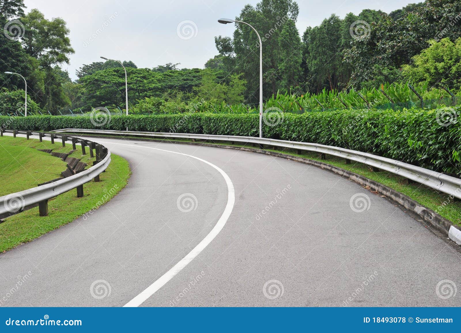 Curving Road stock photo. Image of lane, fence, curve - 18493078