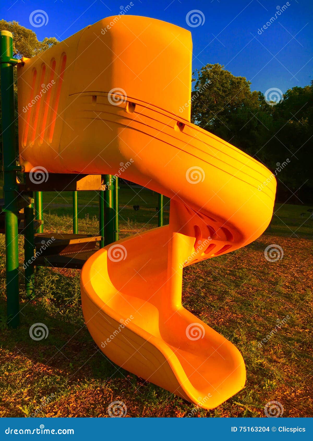Curvy Yellow Slide stock photo. Image of color, play - 75163204