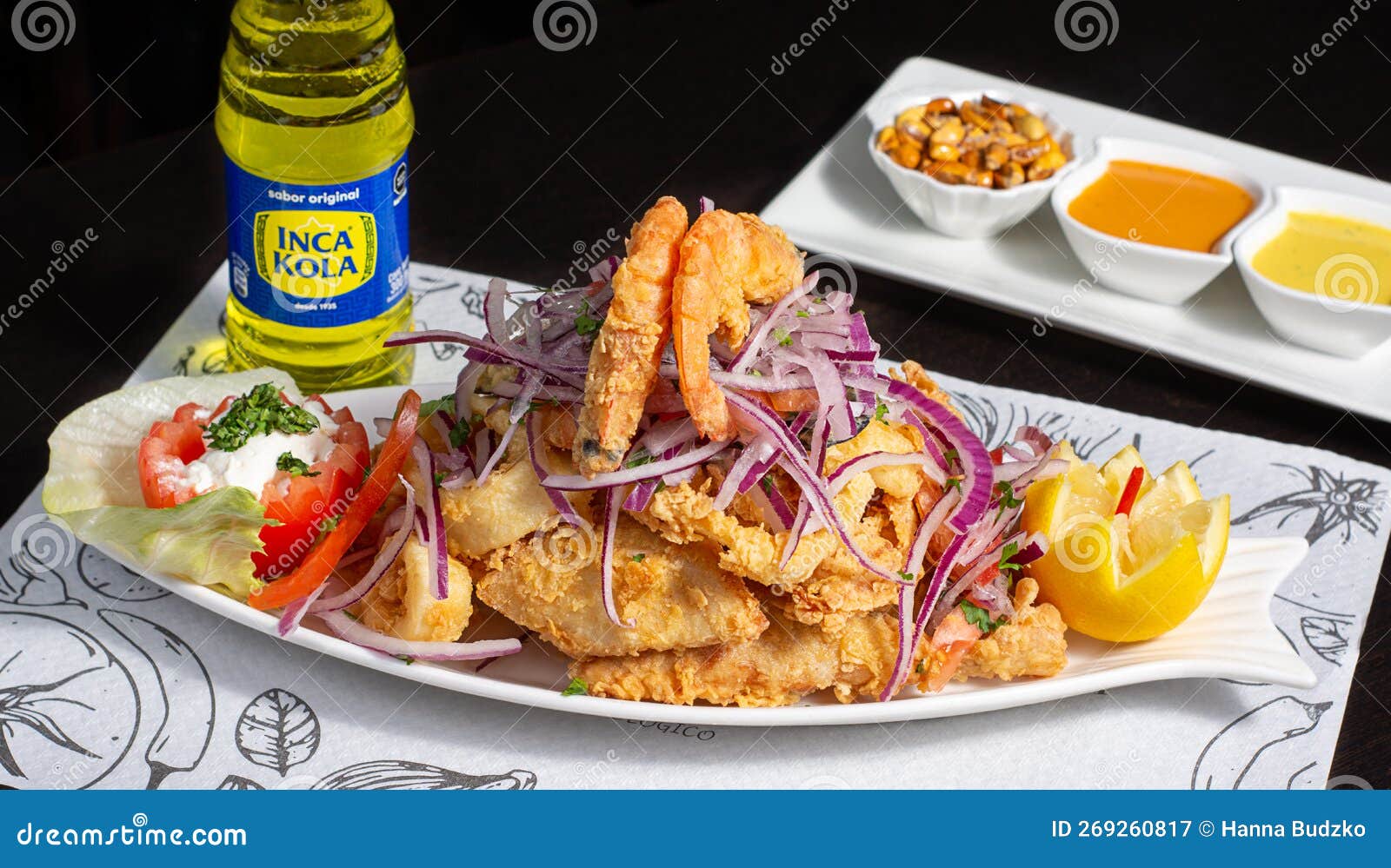 Cusco Peru 28022021. Inca Kola Peruvian Soft Bebe and Frito Fish Dish ...