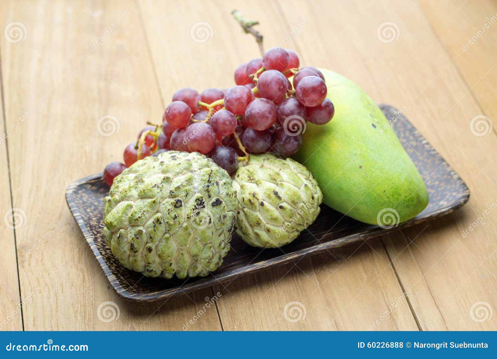 Custard Apple Mango and Red Grape in Wood Plate Stock Photo - Image of ...