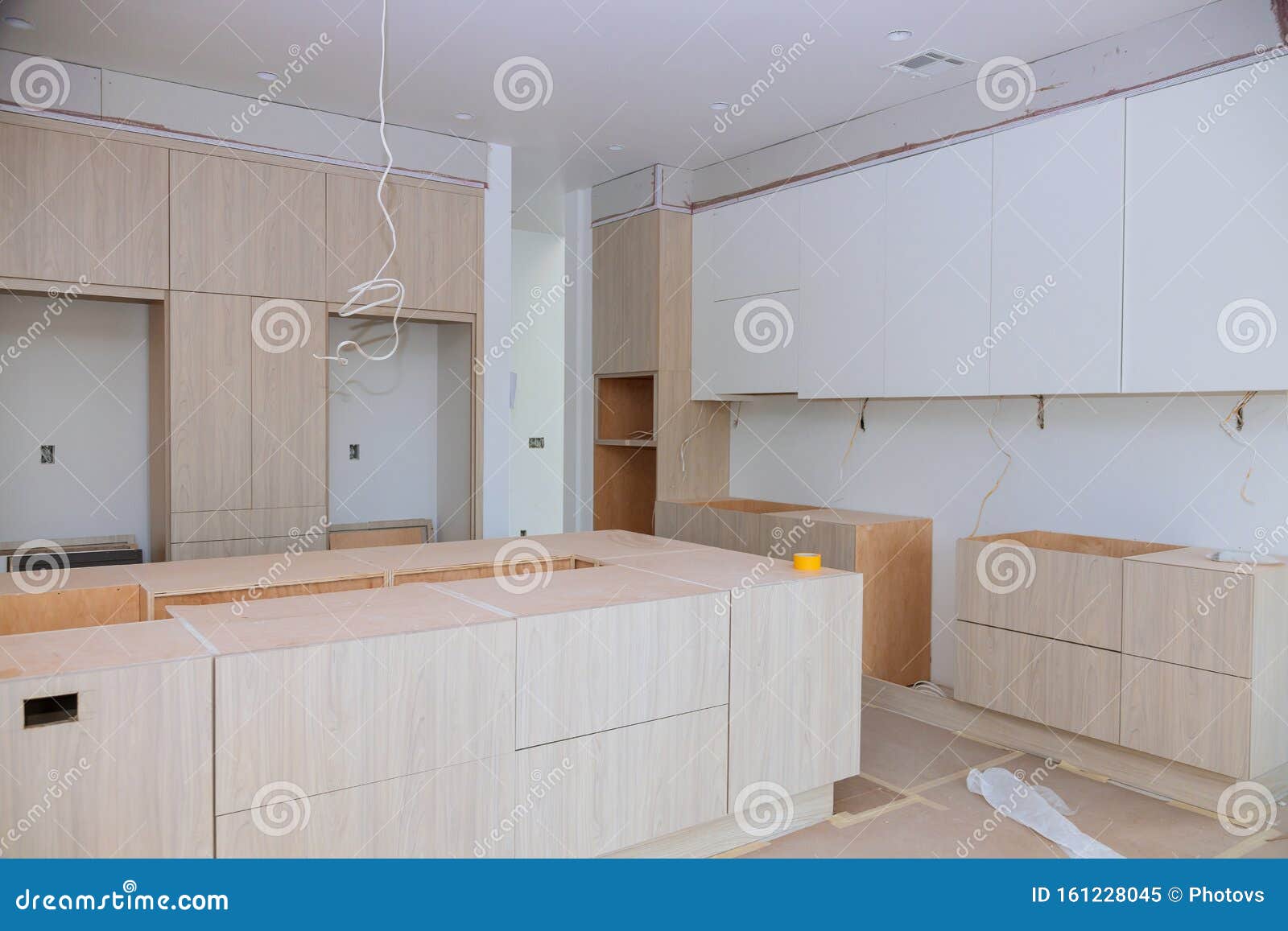 Custom Kitchen Cabinets in Various Stages of Installation Base Stock ...