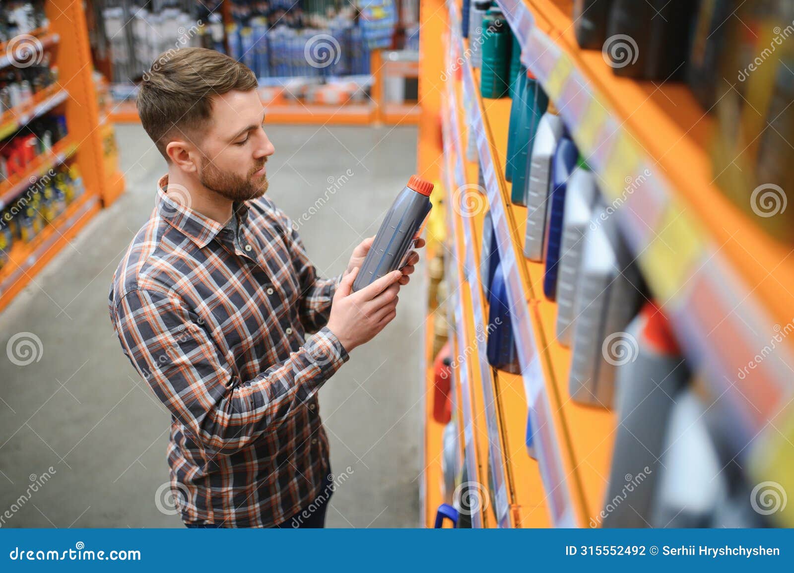 A Customer at an Auto Parts Store Stock Photo - Image of explaining ...