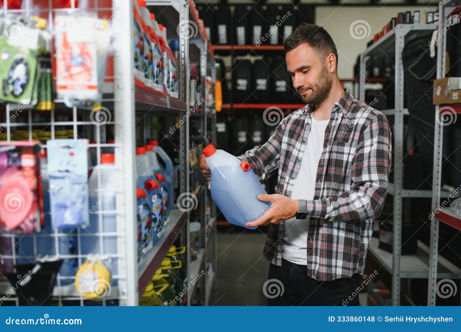 A Customer at an Auto Parts Store Stock Photo - Image of work, young ...