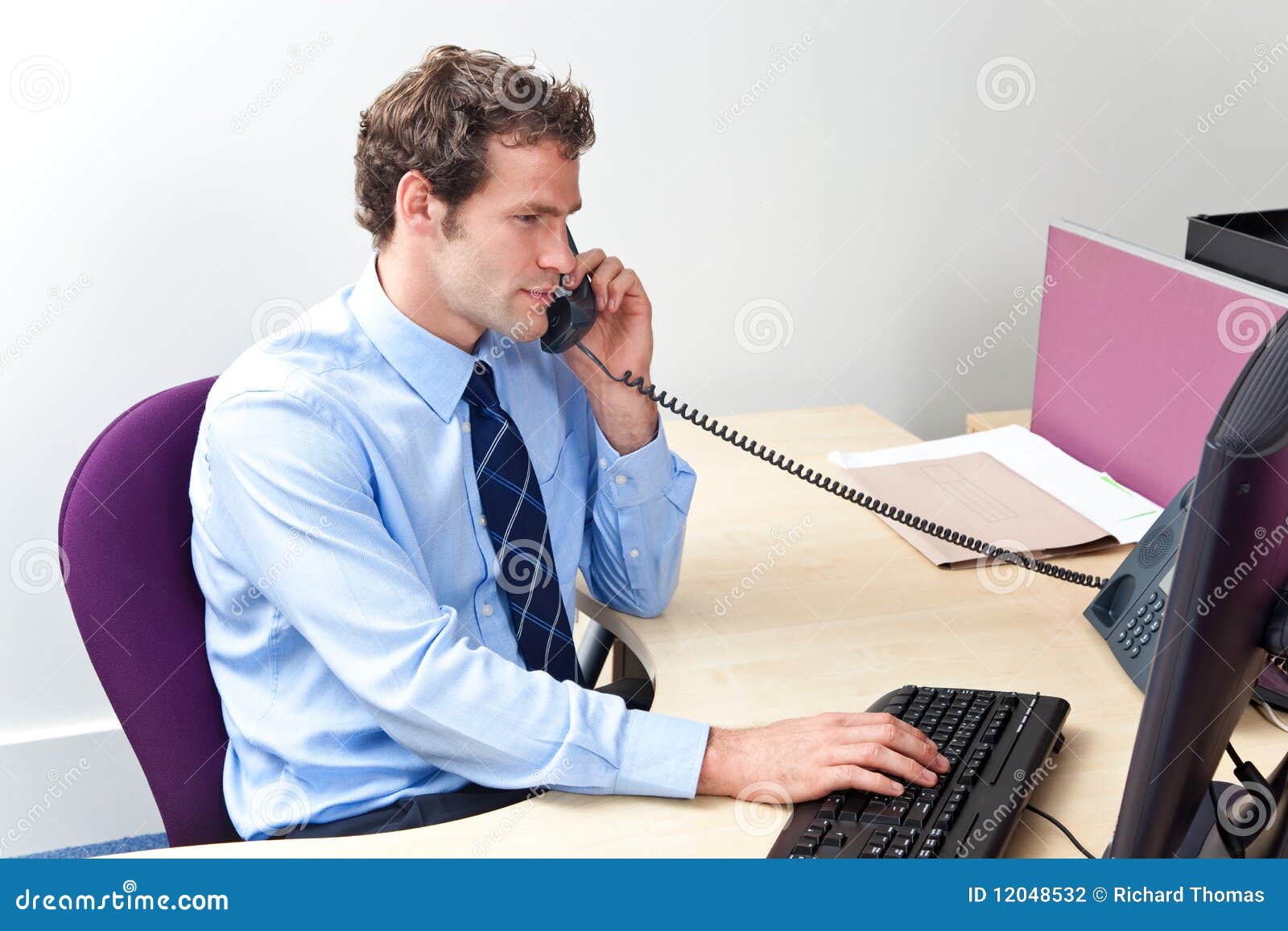 Customer Care Worker in an Office on the Telephone Stock Photo - Image ...