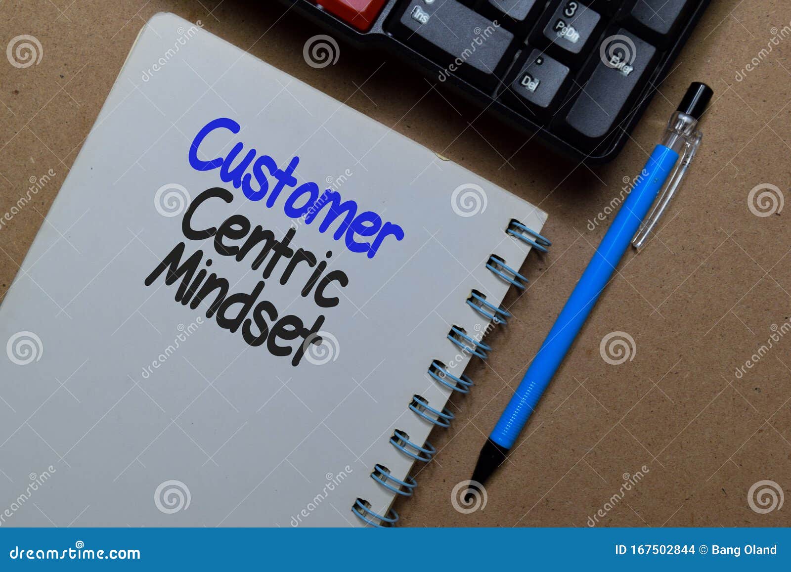 Customer Centric Mindset Write on a Book Isolated on Office Desk Stock ...