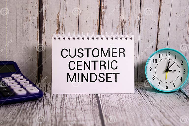 Customer Centric Mindset Write on a Book Isolated on Office Desk Stock ...