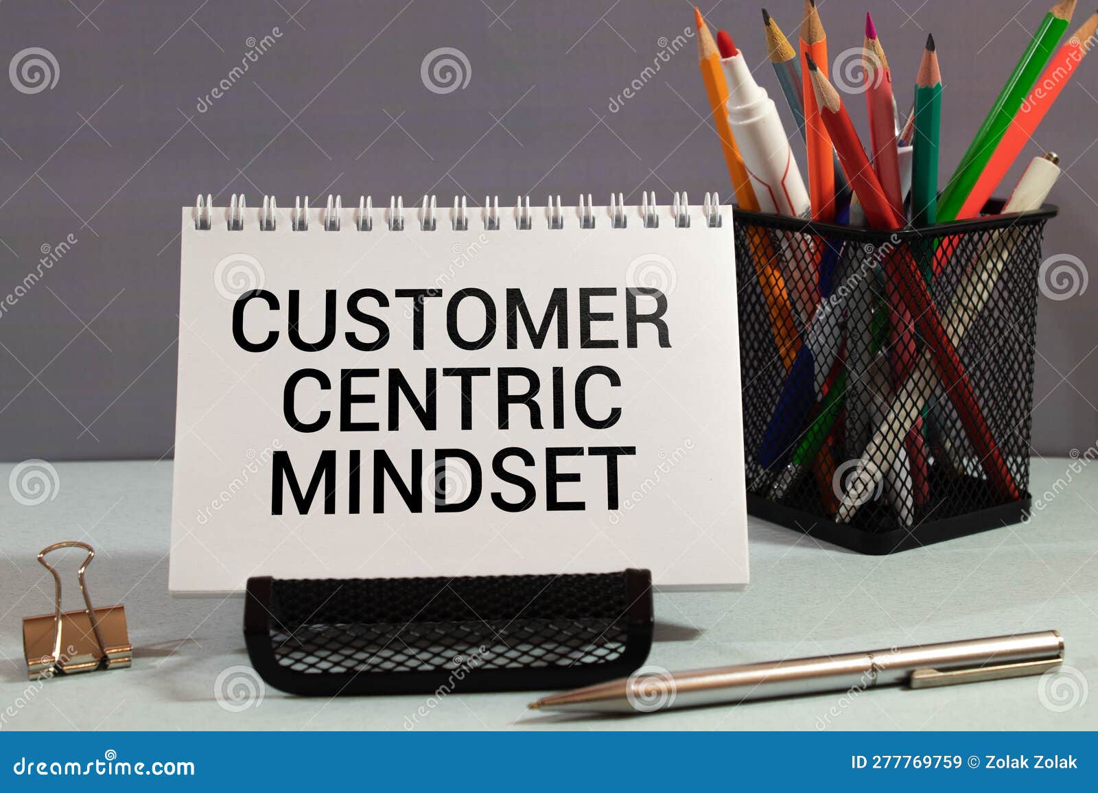 Customer Centric Mindset Write on a Book Isolated on Office Desk Stock ...