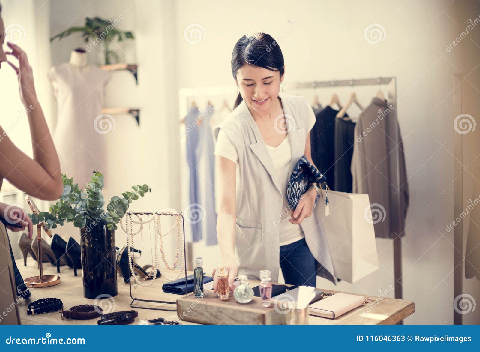 Customer Checking Out Clothes and Perfume Stock Image - Image of ...