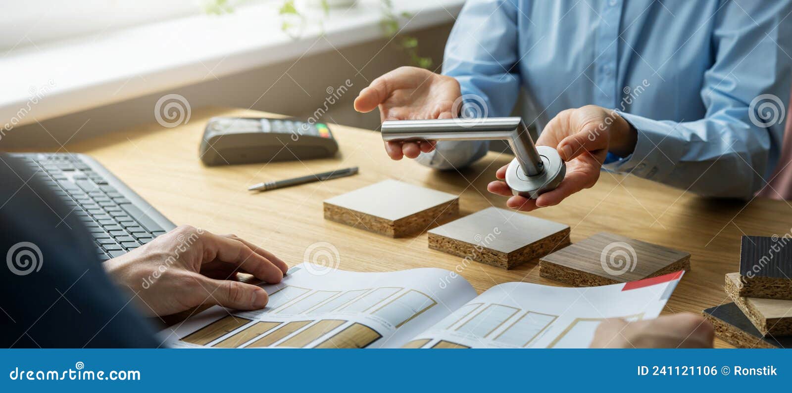 Customer Chooses Door Design and Hardware in Door Store Stock Photo ...