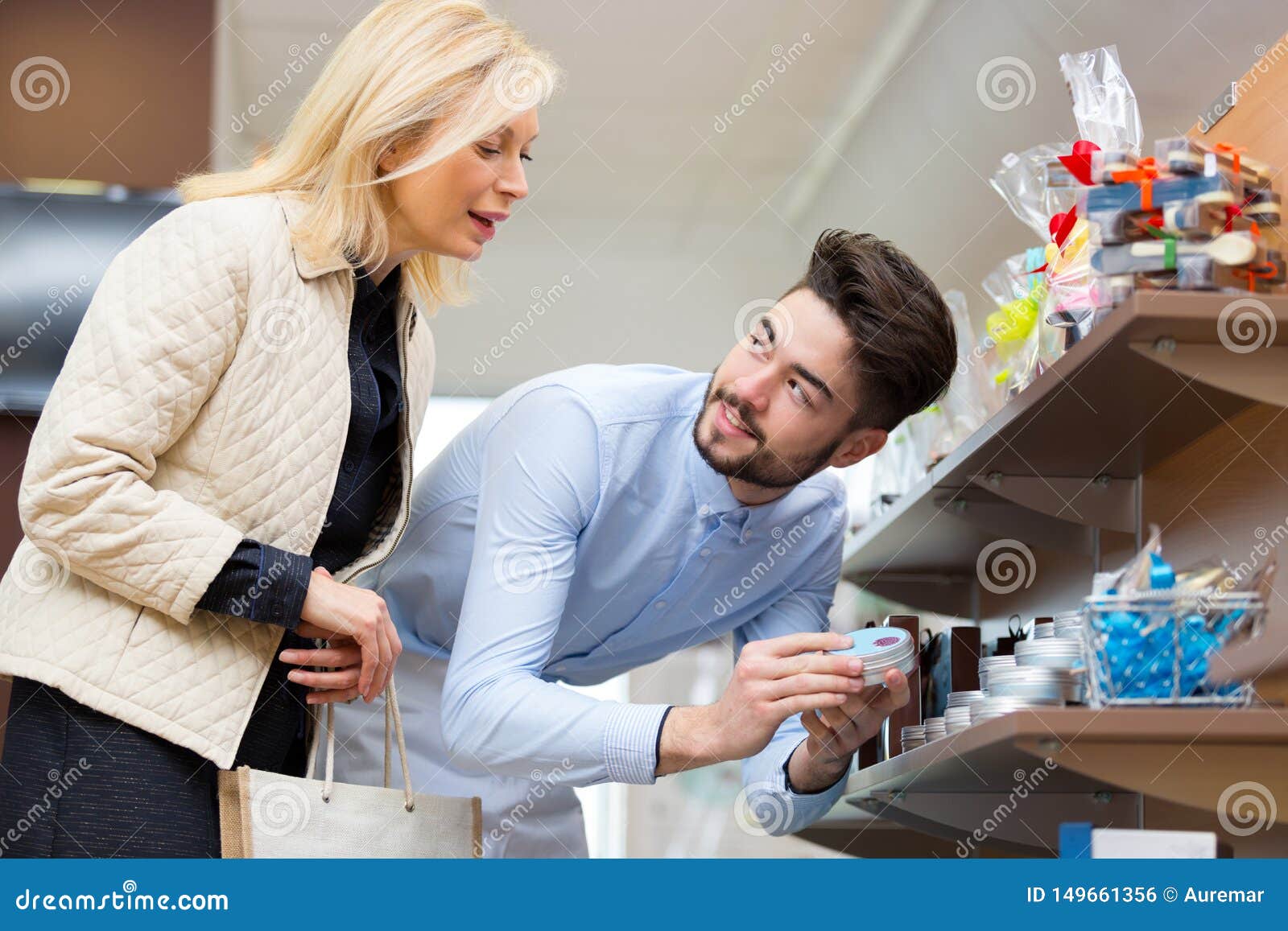 Customer Choosing Delicious Milk Chocolate from Shelf Stock Photo ...