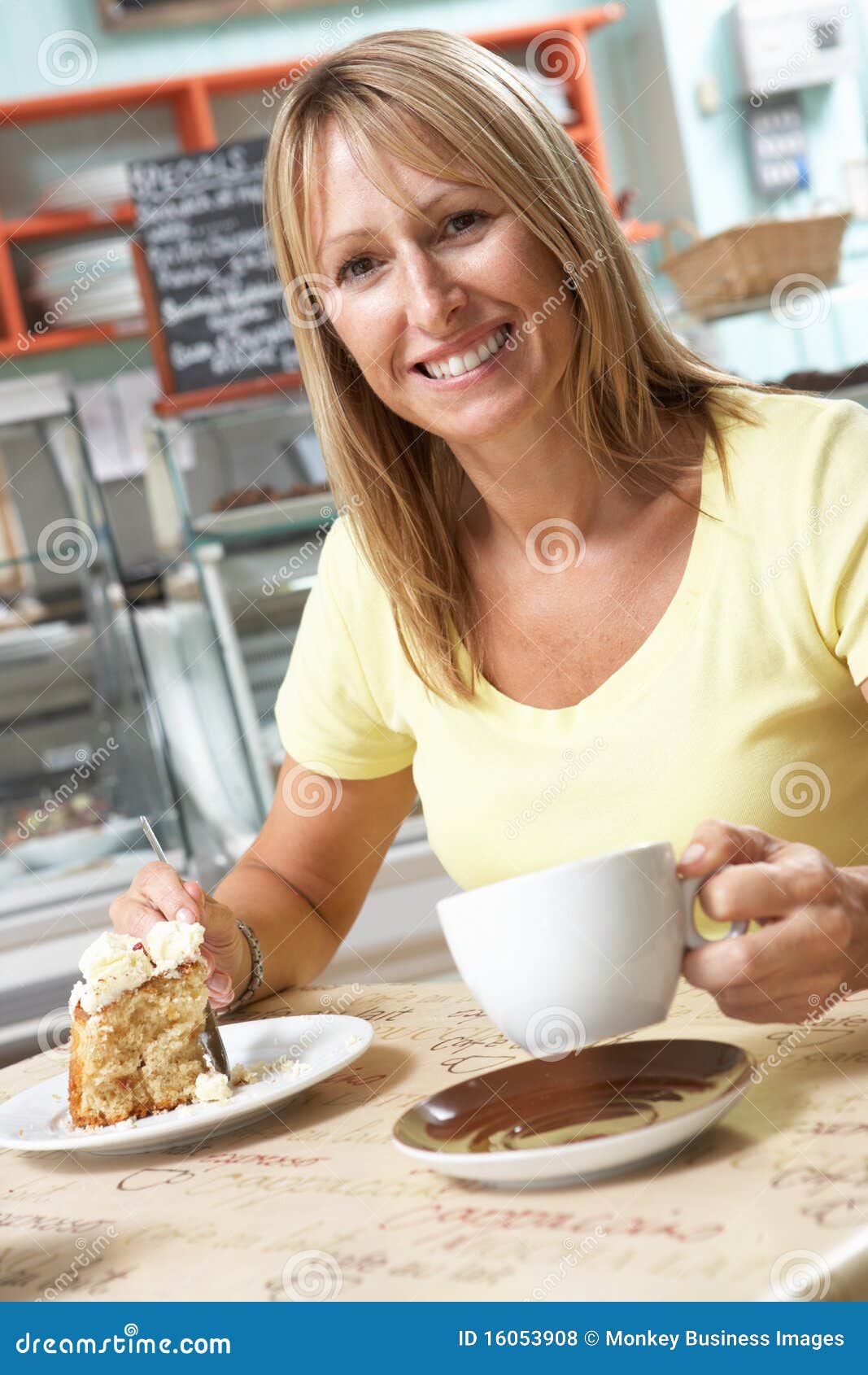 Customer Enjoying Slice of Cake and Coffee in Cafe Stock Photo - Image ...