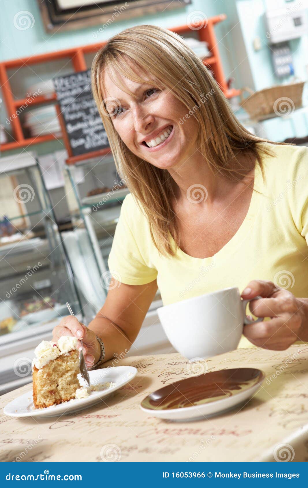 Customer Enjoying Slice of Cake and Coffee in Cafe Stock Photo - Image ...