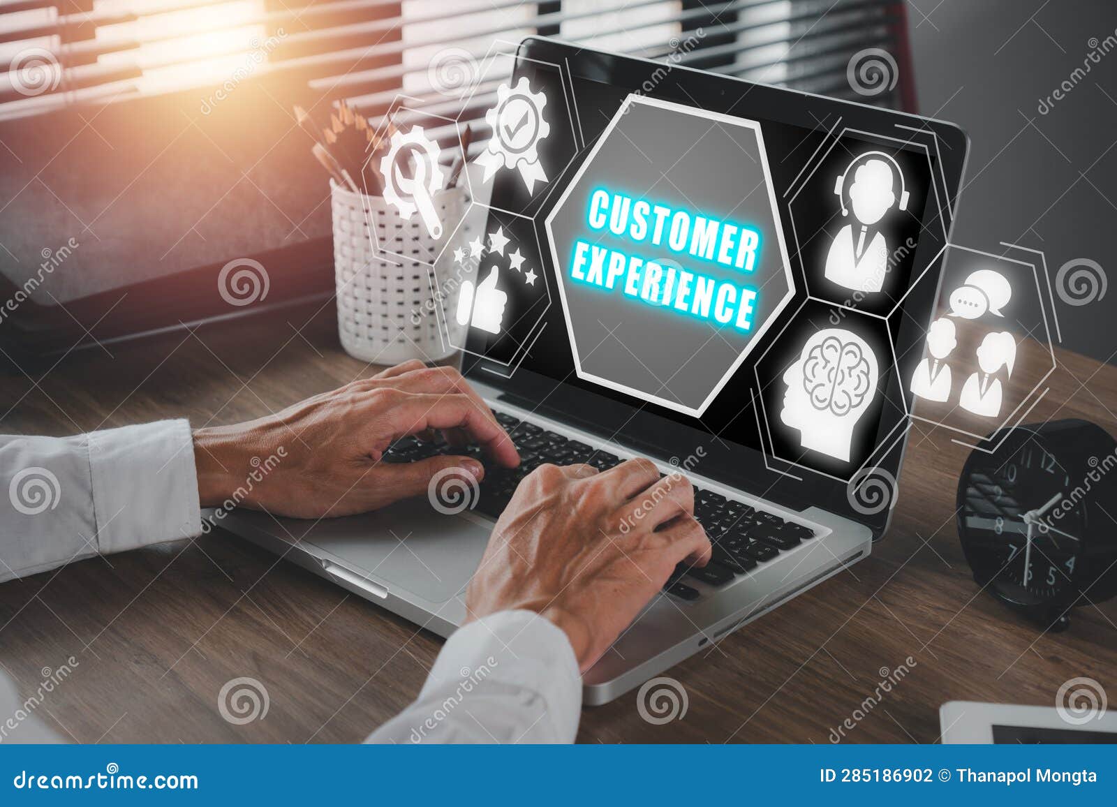 Businessman Working on Laptop Computer with Customer Experience Icon on ...