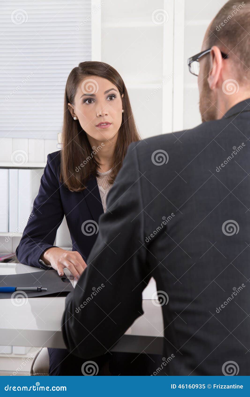Customer and Female Financial Agent in a Discussion at Desk. Stock ...