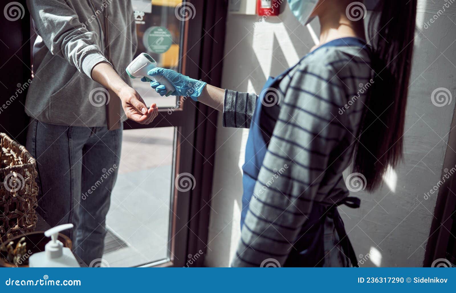 Customer Going through Temperature Check before Entering Cafe Stock ...