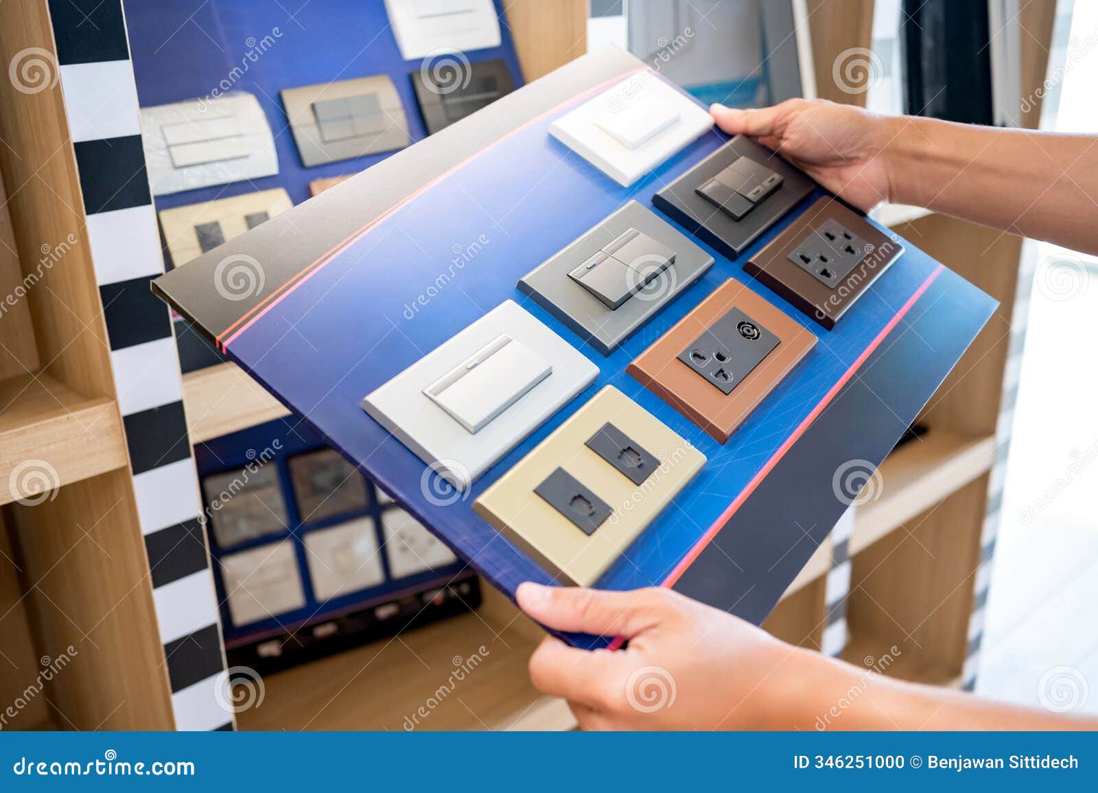 Customer Hand Choosing Lighting Switch And Electric Socket On Product Sample Display Board Stock ...