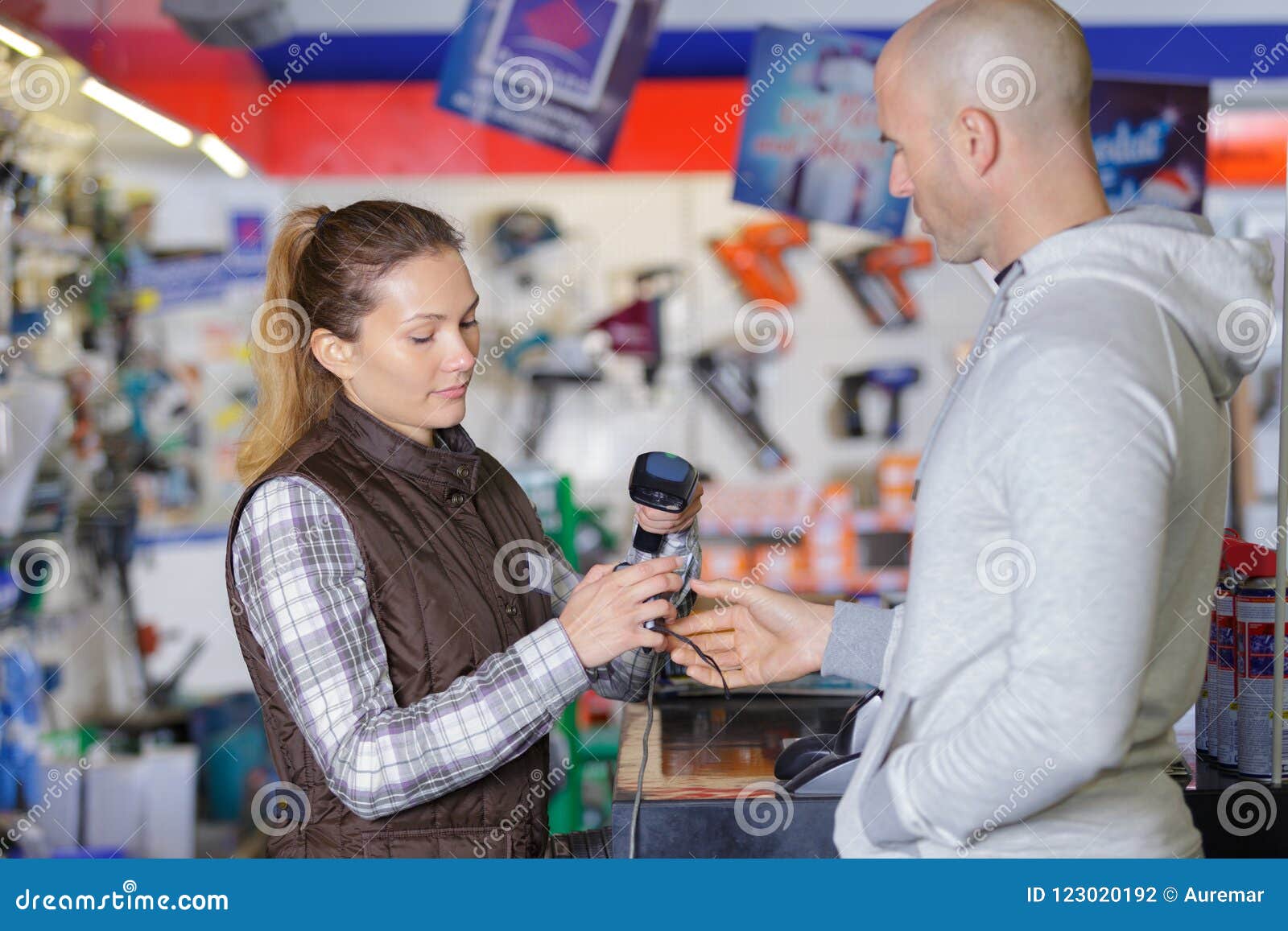 Customer in hardware store stock photo. Image of offer - 123020192