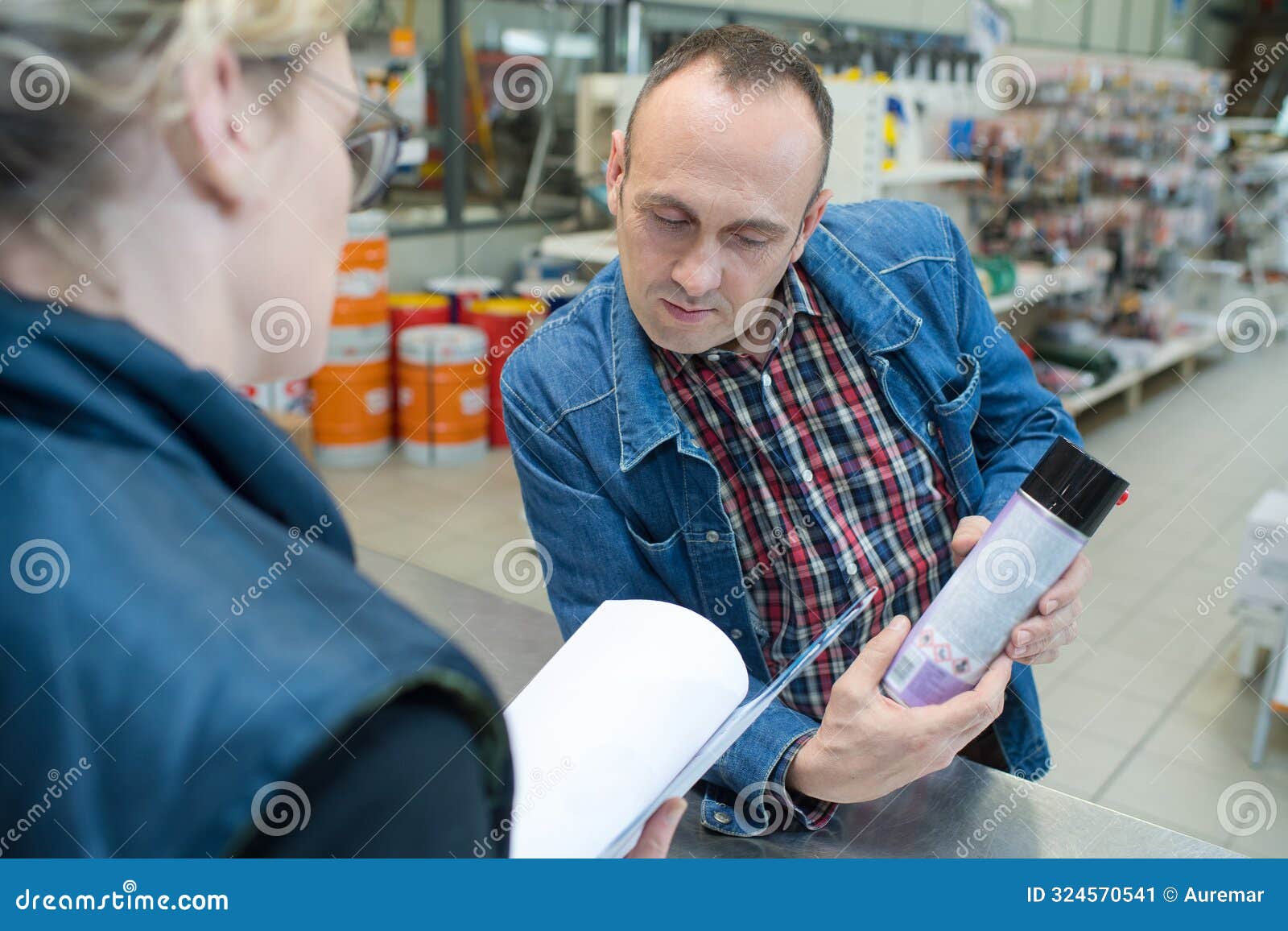 Customer in Hardware Store Enquiring about Spray Can Stock Image ...