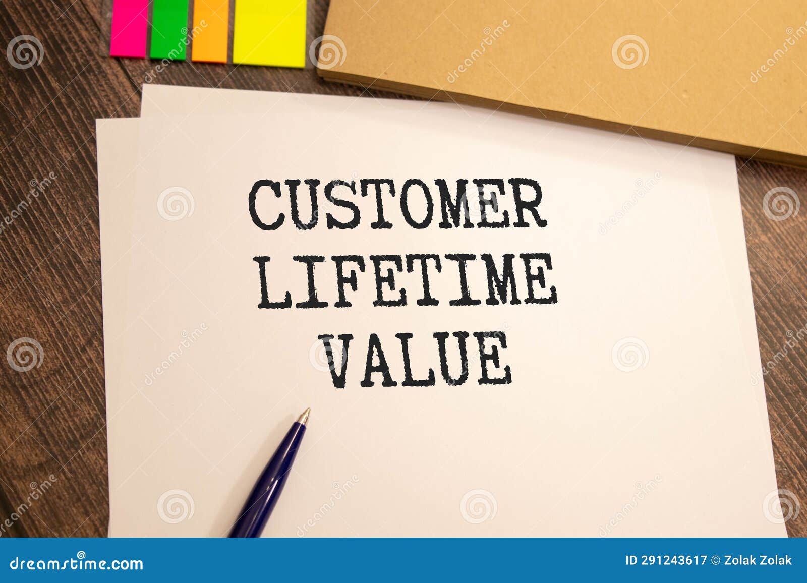 Customer Lifetime Value - Handwritten Text in a Notebook on a Desk - 3d ...