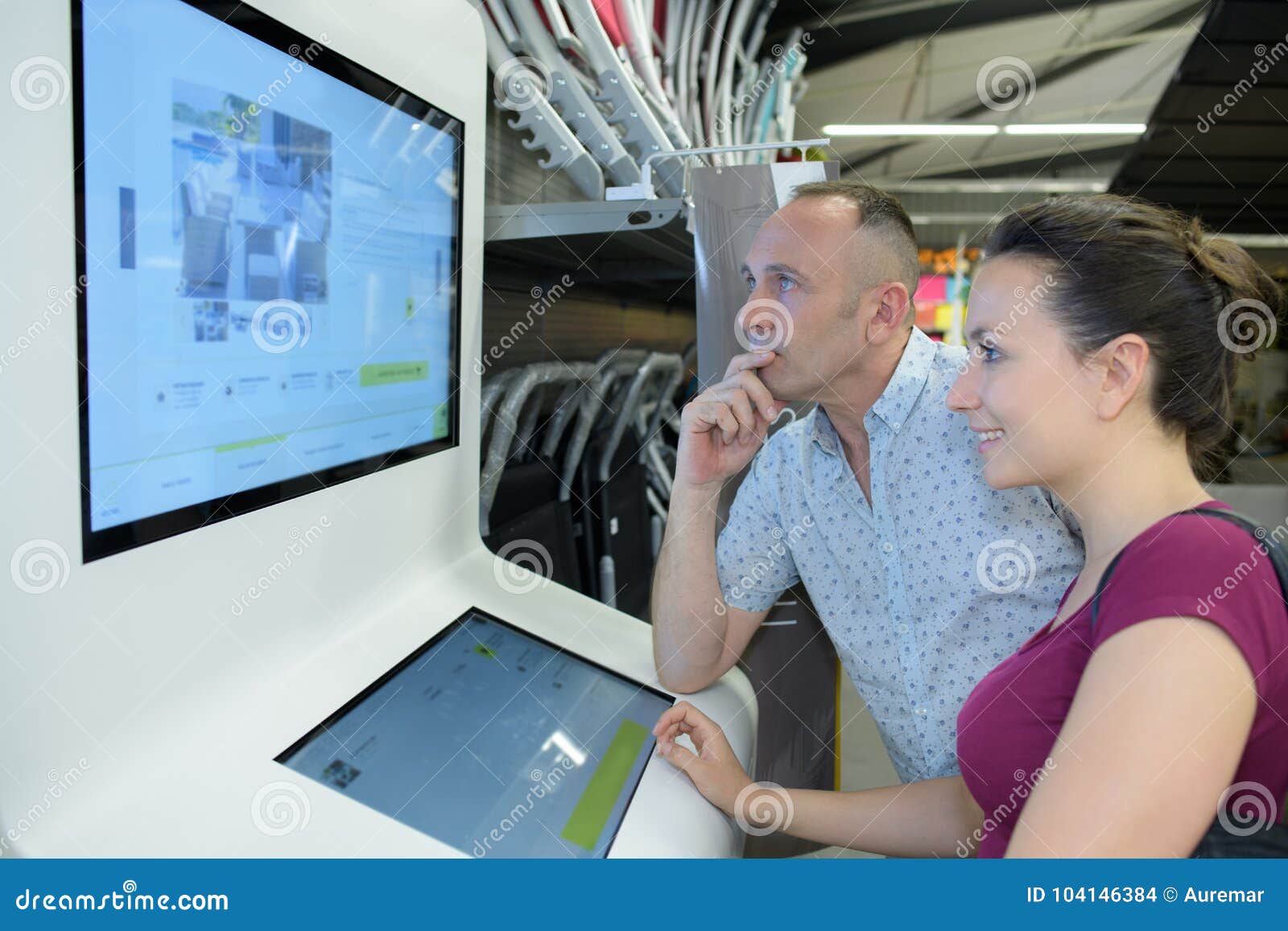 Customer looking at screen stock photo. Image of establishment - 104146384
