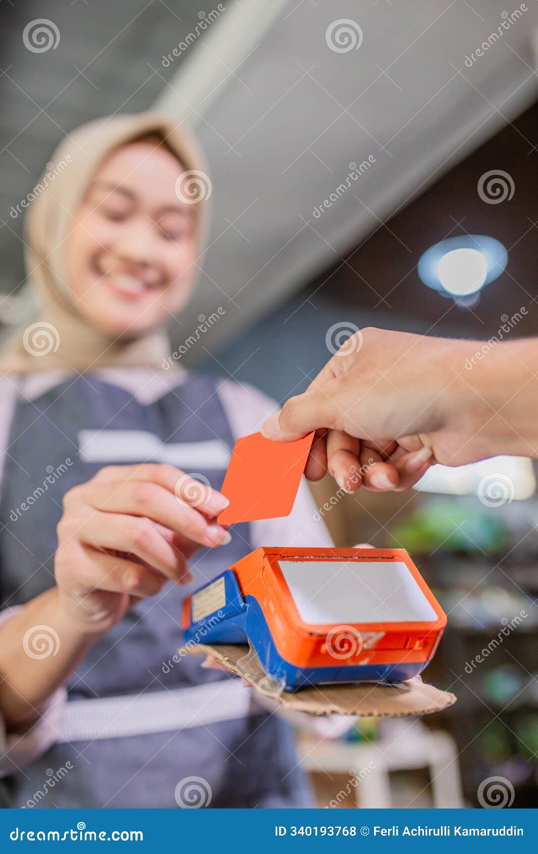 A Customer is Making a Contactless Payment at a Retail Store Checkout ...