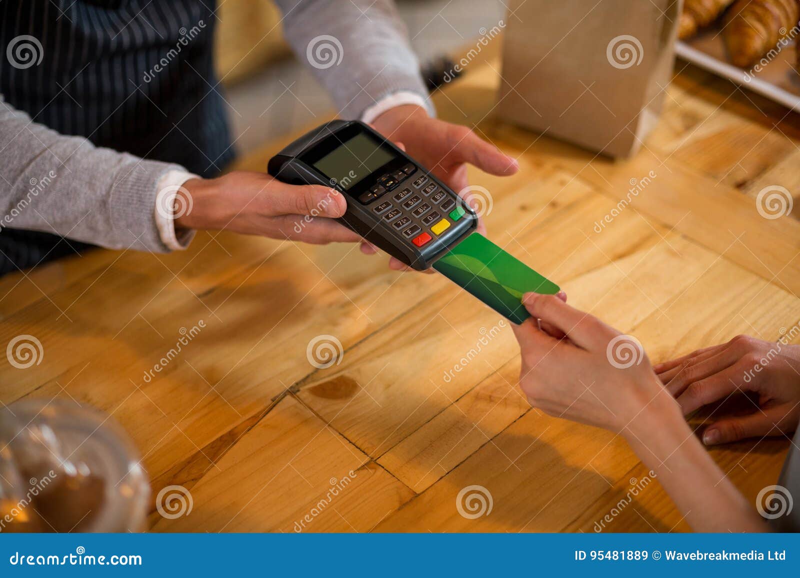 Customer Making Payment through Credit Card at Counter Stock Image ...