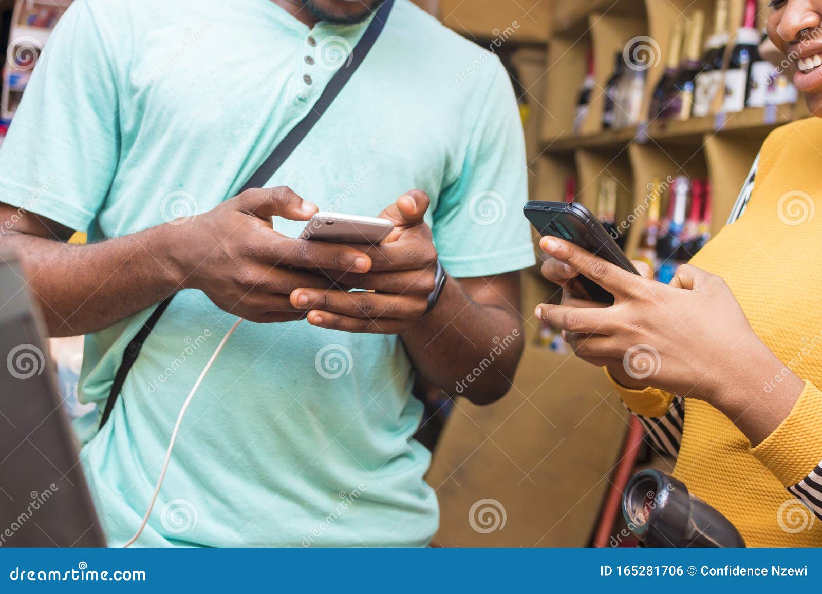 Customer Making Payment with Mobile Transfer in a Retail Store Stock ...